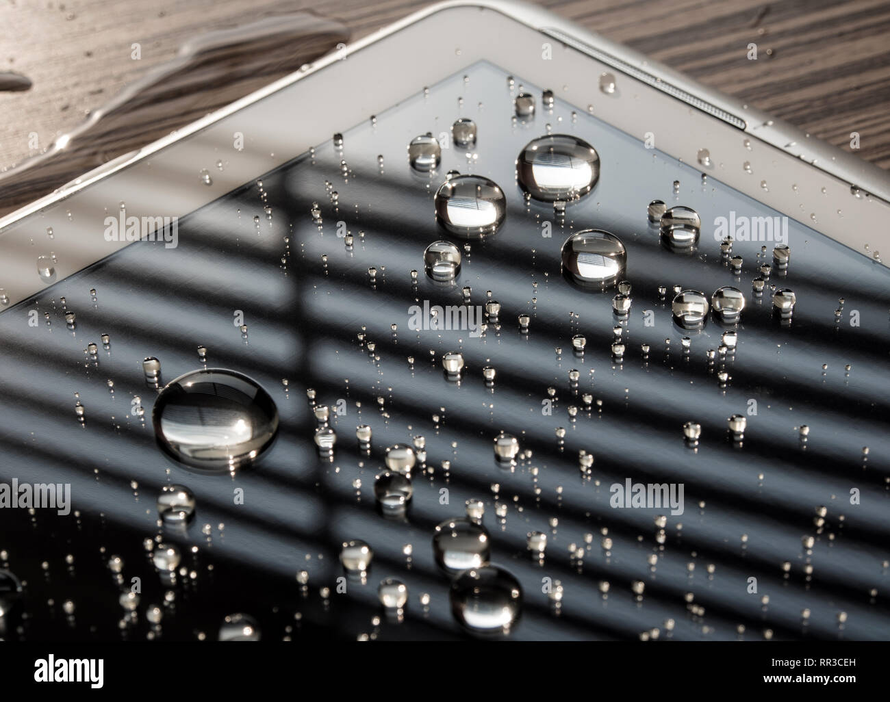 Water spilled onto the tablet, Drops of water on tablet screen Stock ...