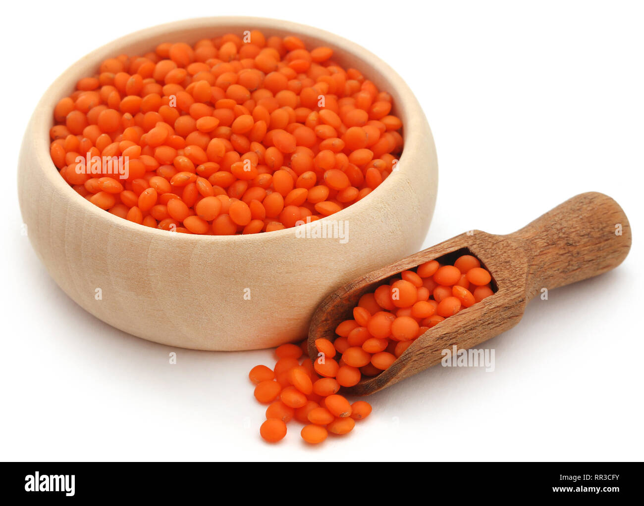 Fresh organic lentil in a bowl over white background Stock Photo - Alamy