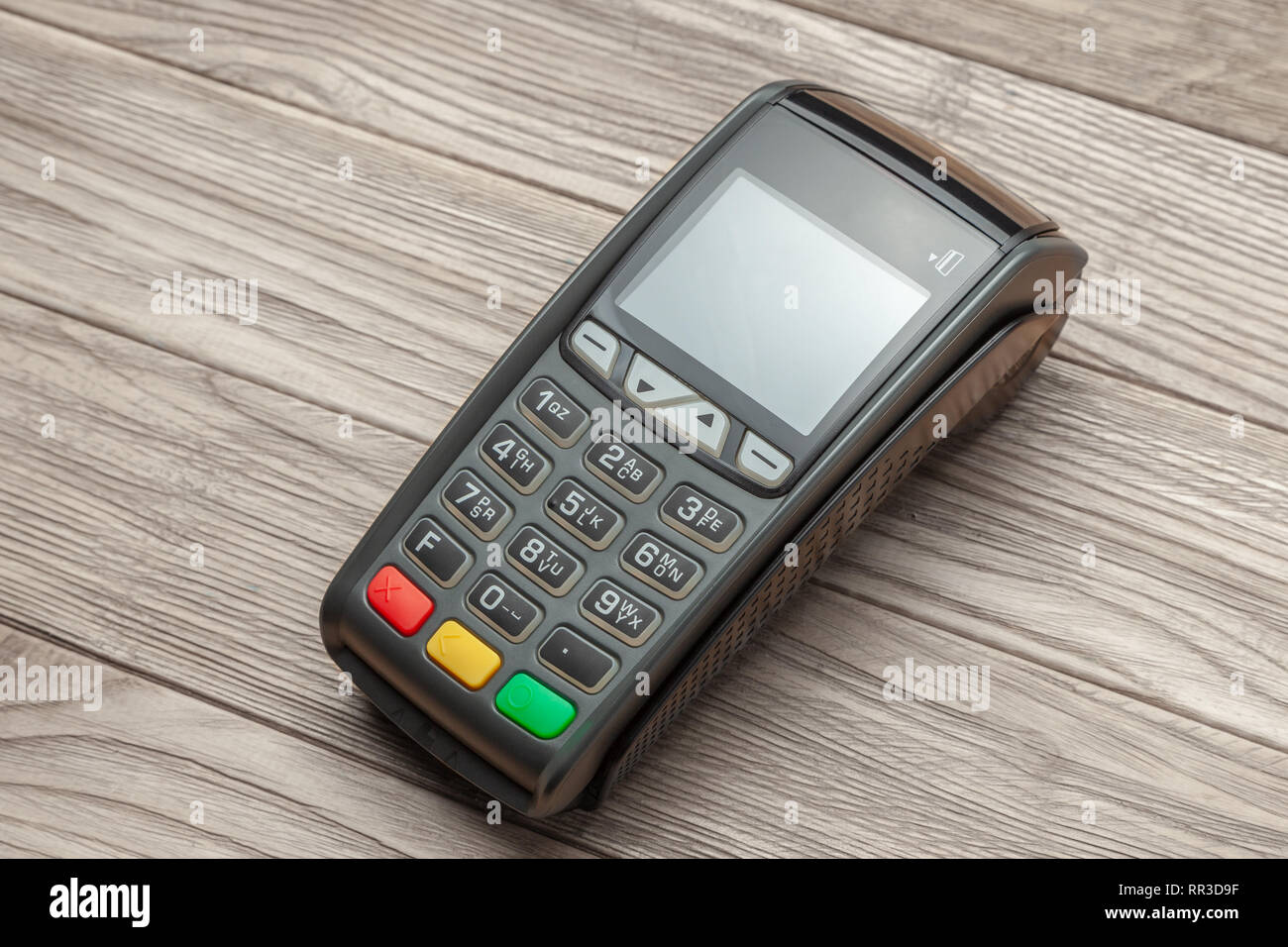 POS terminal, Payment Machine on wooden background. Contactless payment ...