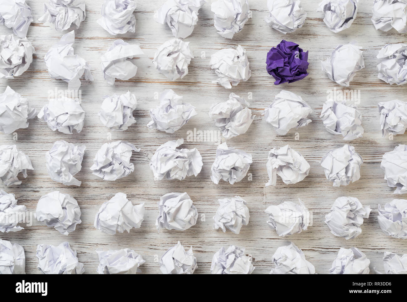 Set of crumpled paper balls with one colorful Stock Photo - Alamy