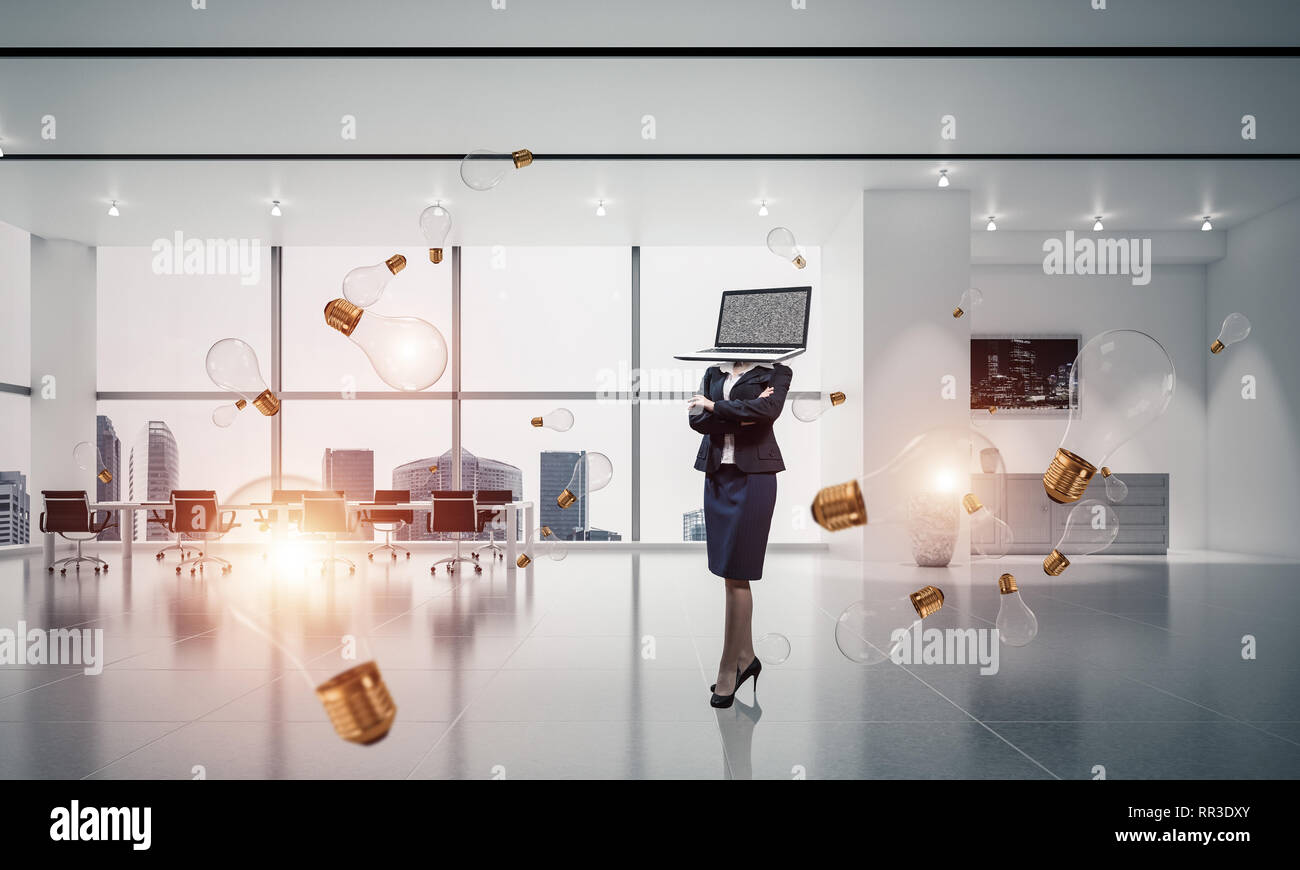 Business woman in suit with laptop instead of head keeping arms crossed ...