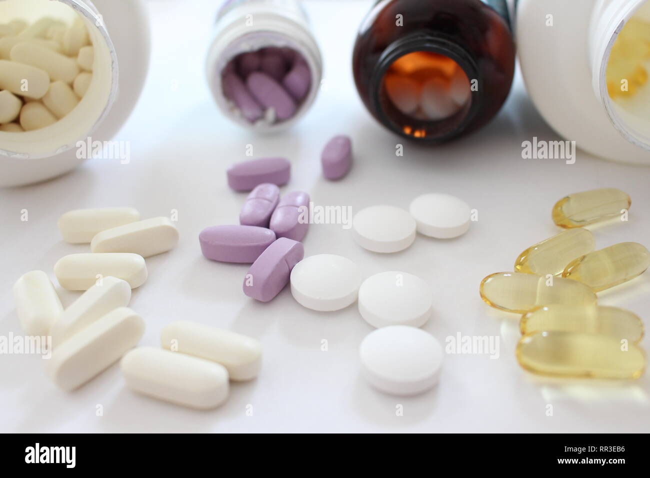 A close up photograph of a variety of medication, tablets and pills ...