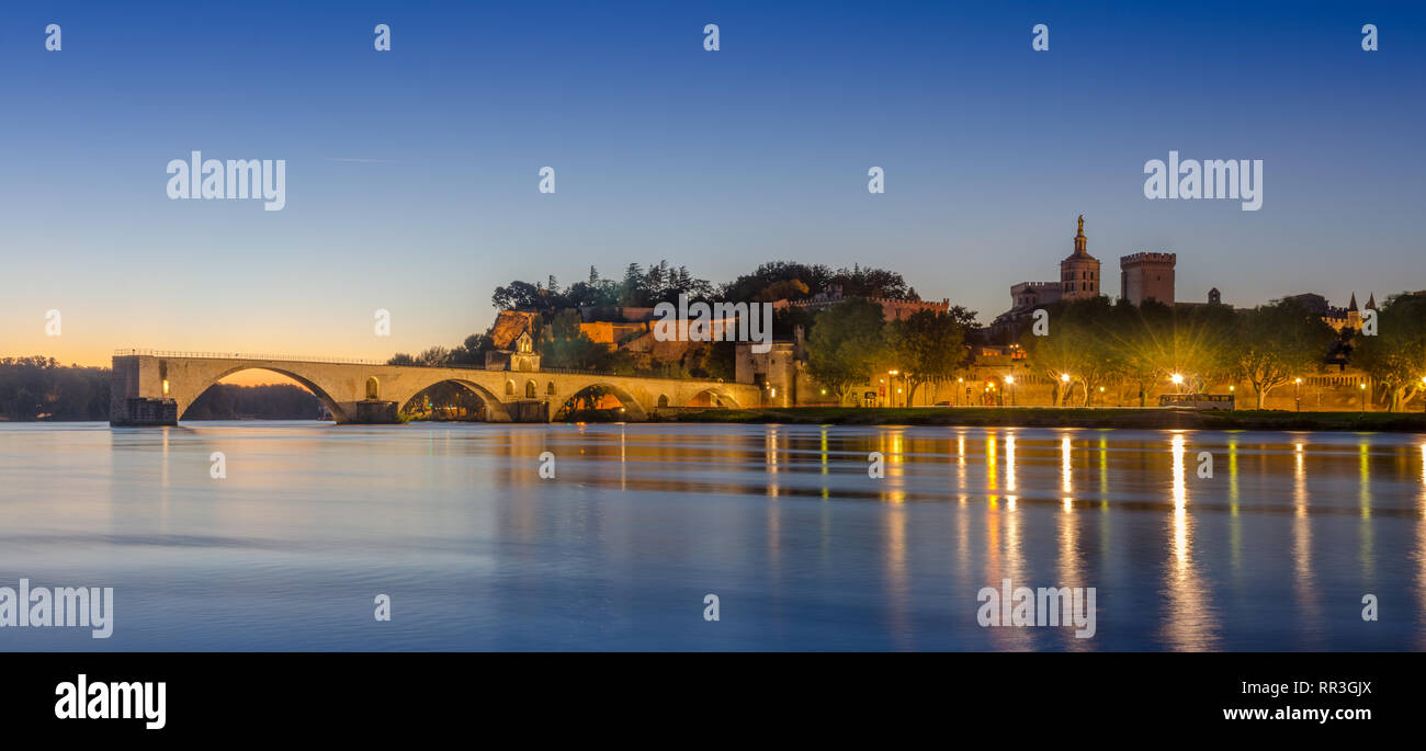 a view of the Pont d'Avignon or Benezet bridge and Palais des Papes of ...