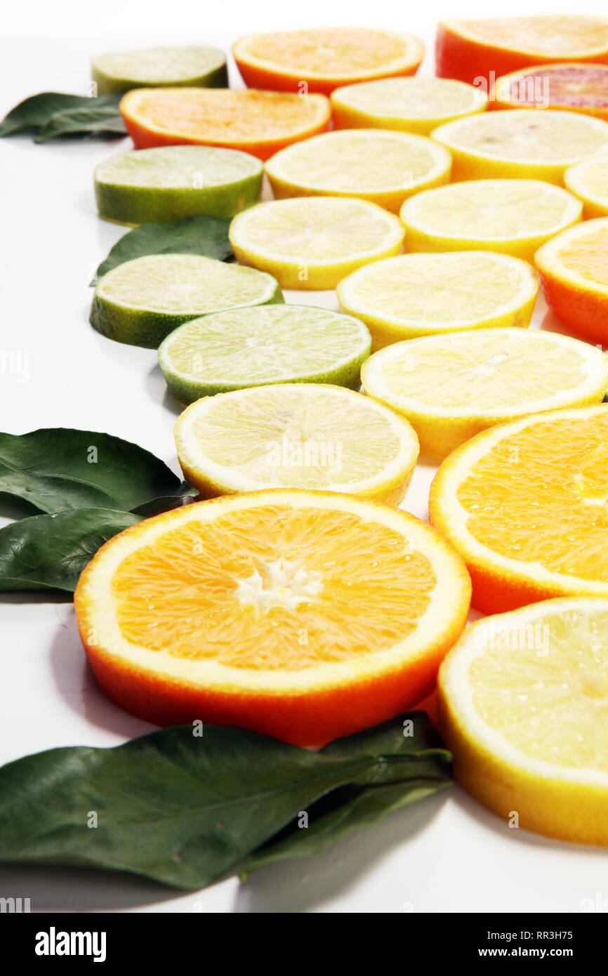 Citrus fruits with orange, lemon, grapefruit and lime on white ...