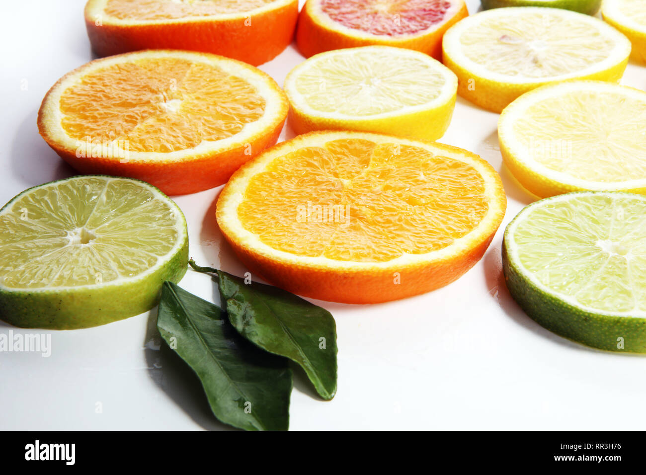 Citrus fruits with orange, lemon, grapefruit and lime on white background Stock Photo - Alamy