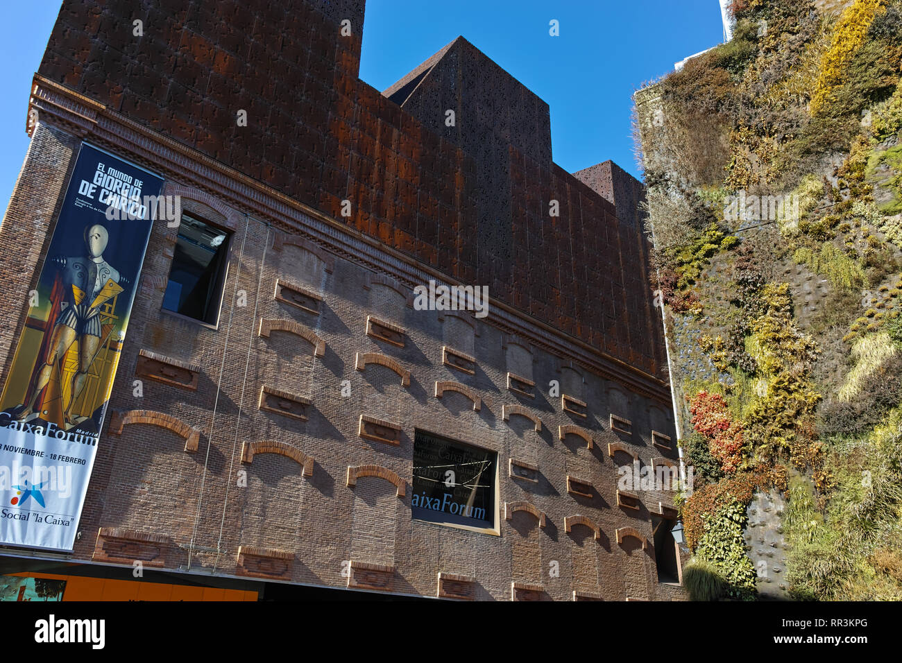 MADRID, SPAIN - JANUARY 22, 2018: Vertical garden wall and CaixaForum ...