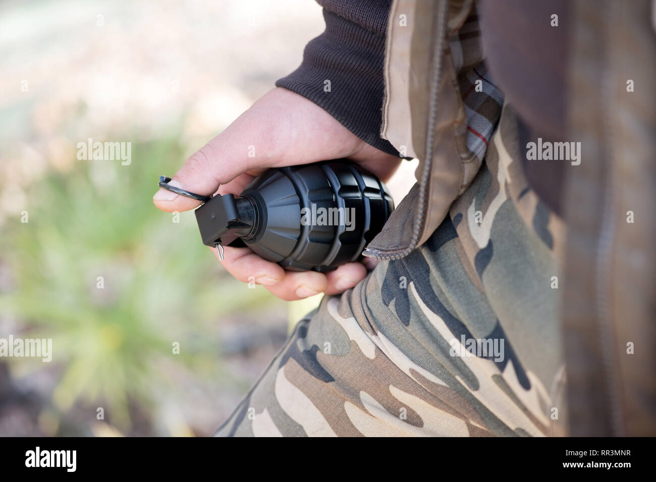 Holding grenade hi-res stock photography and images - Alamy