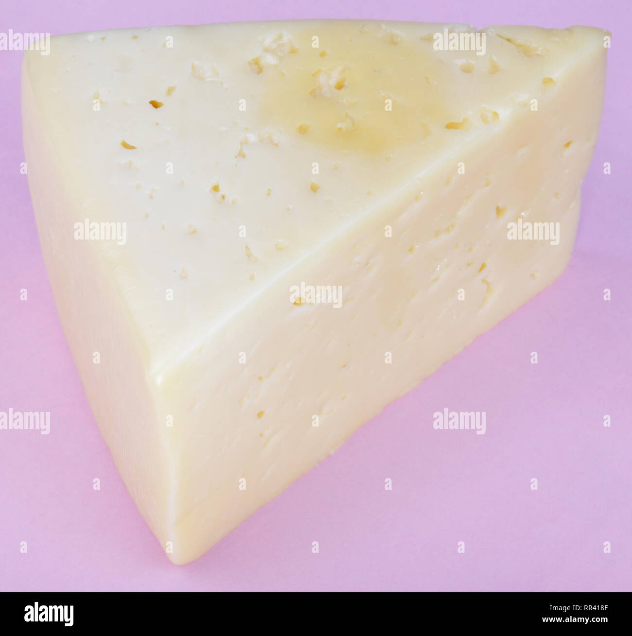 cheese on pink background Stock Photo - Alamy