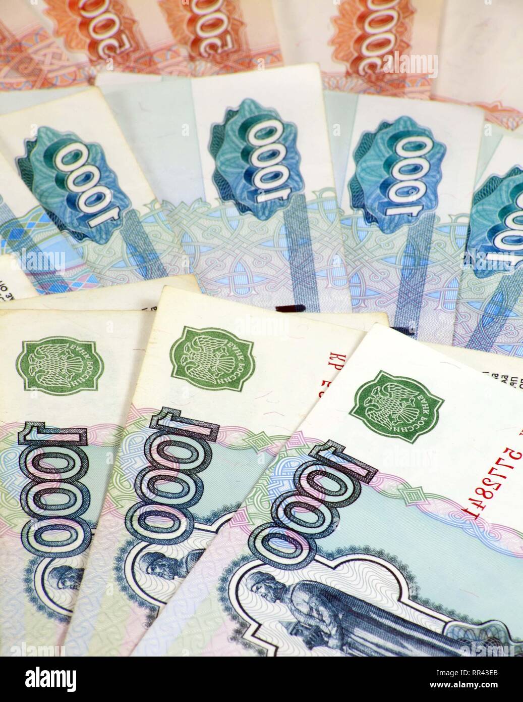 stack of bond 5000 and 1000 Stock Photo - Alamy