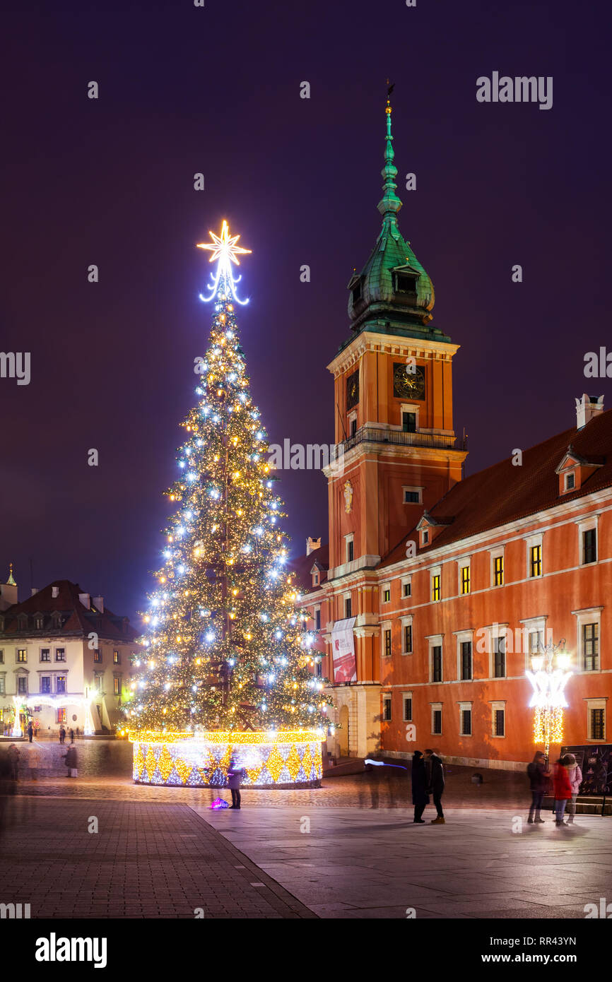 Poland, city of Warsaw, illuminated Christmas tree and Royal Castle at ...