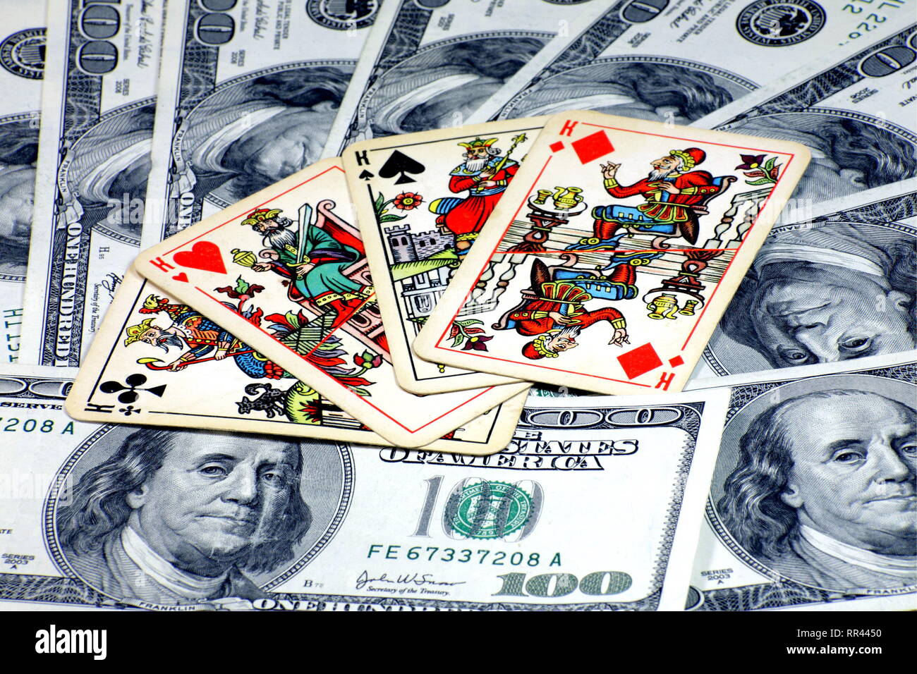 american dollars banknote with playing cards Stock Photo - Alamy