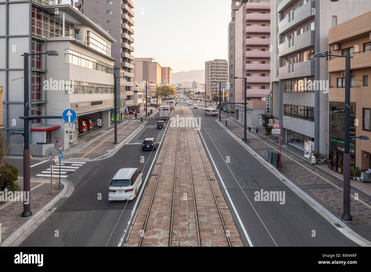Main road with tram tracks in Hiroshima, Japan Stock Photo - Alamy