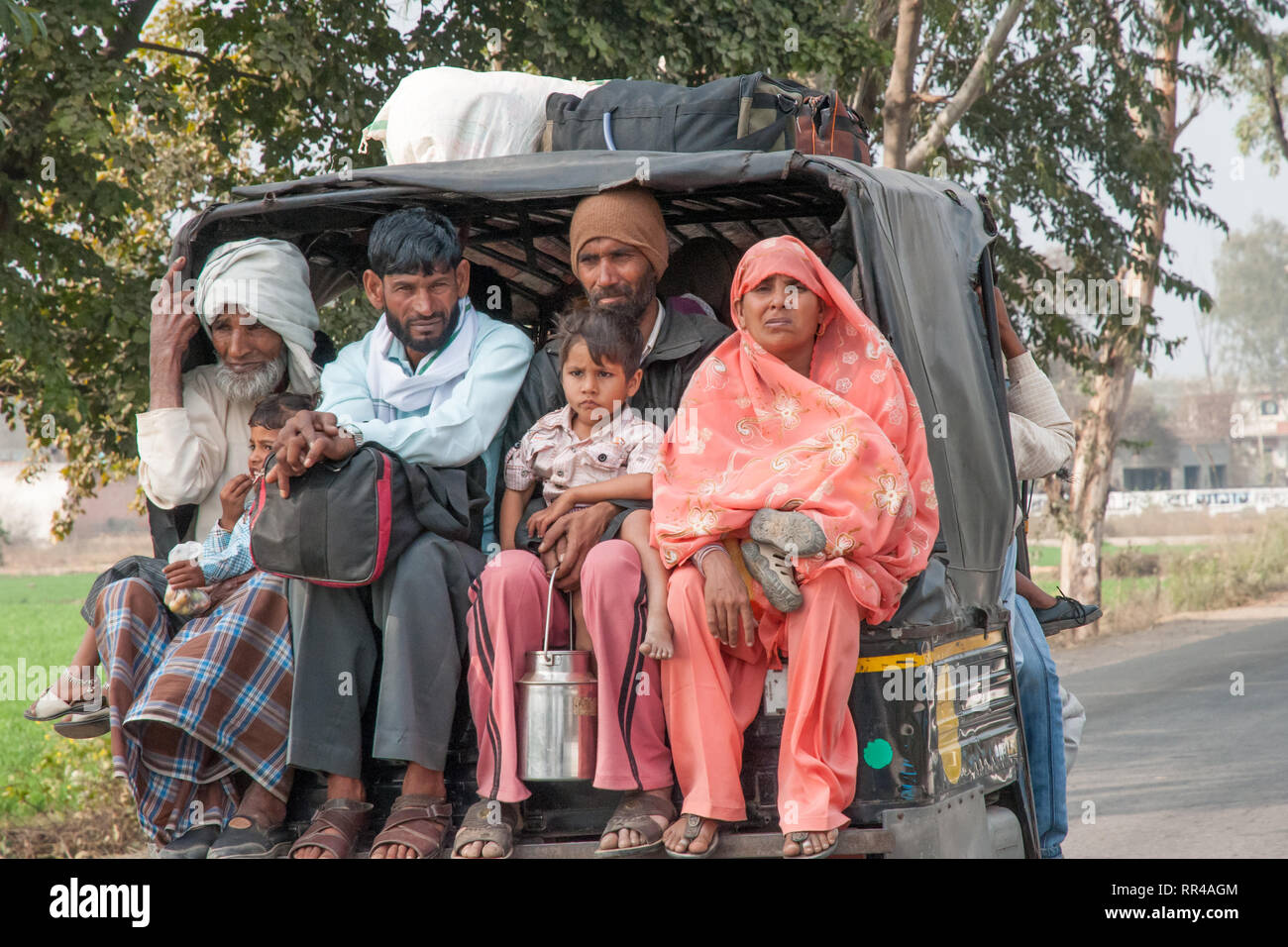 Uttar pradesh india man woman crowded rickshaw hi-res stock photography ...