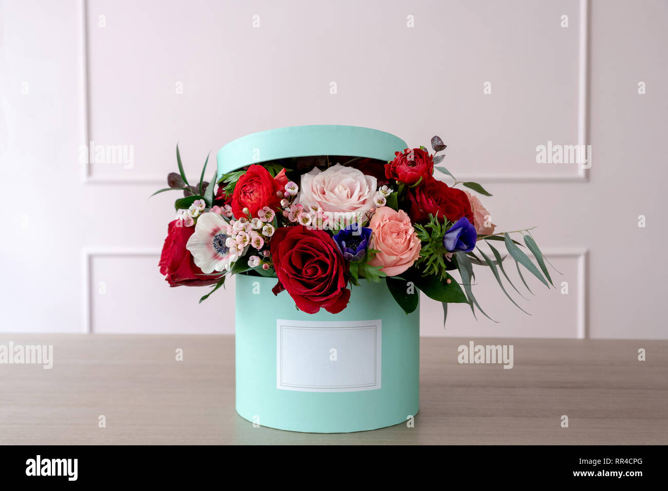 Beautiful bouquet of flowers in a box Stock Photo - Alamy