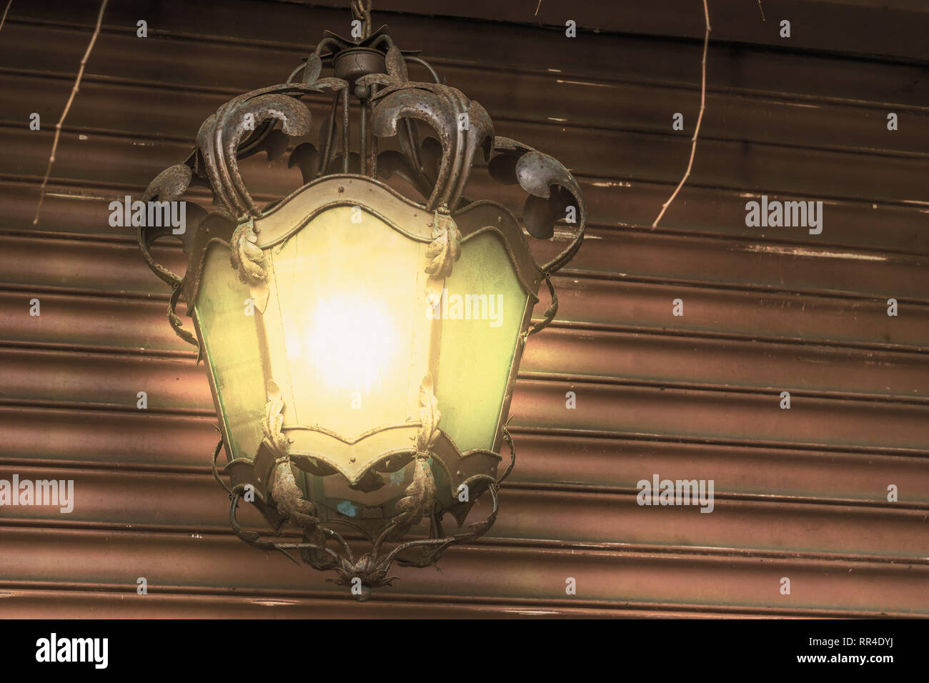 lighted vintage lantern, house or garden decoration at night, classical ...