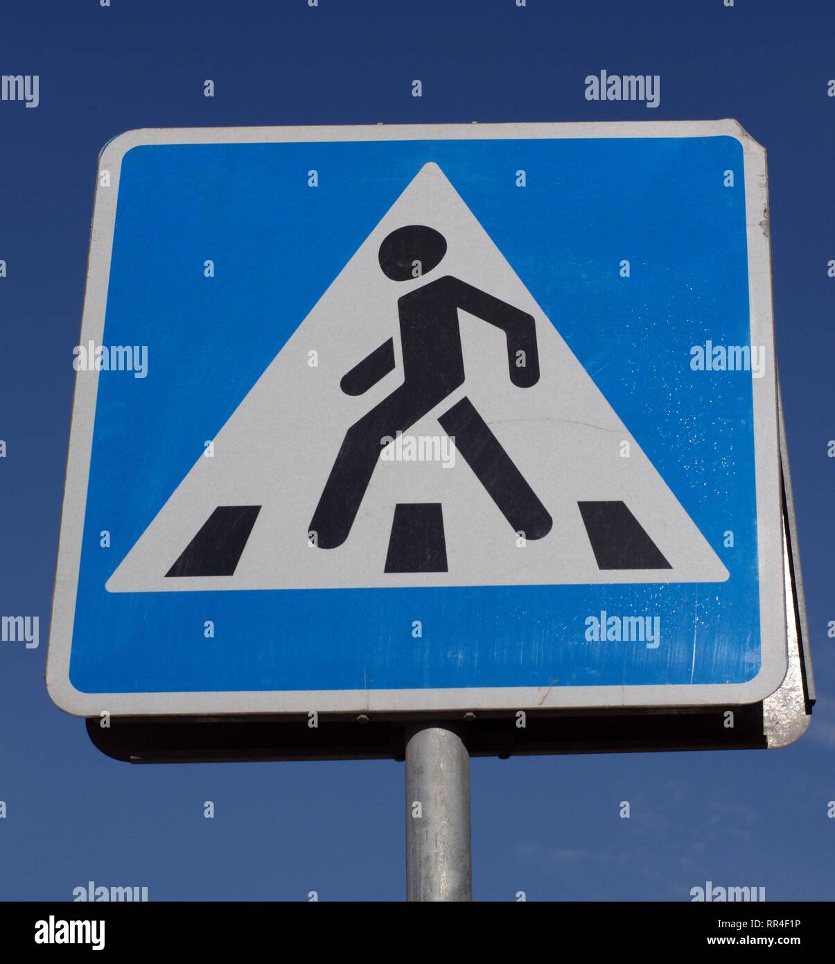 pedestrian crossing sign on street Stock Photo - Alamy
