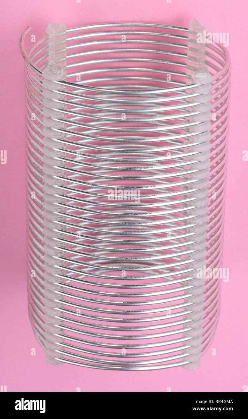 radio coil on pink background Stock Photo - Alamy