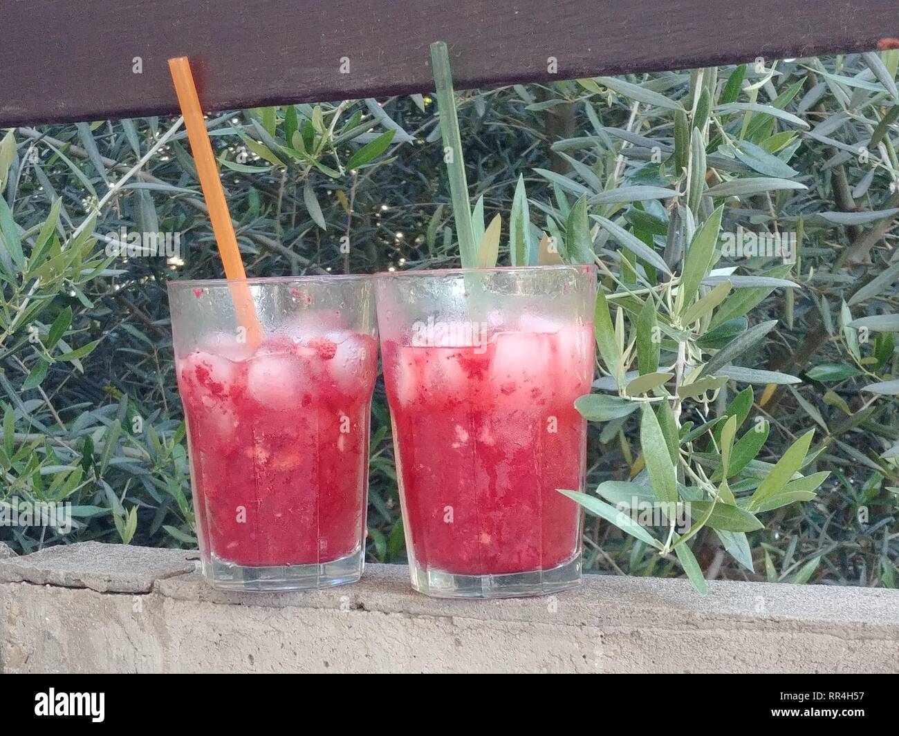 Red cocktail ice orange straw hi-res stock photography and images - Alamy