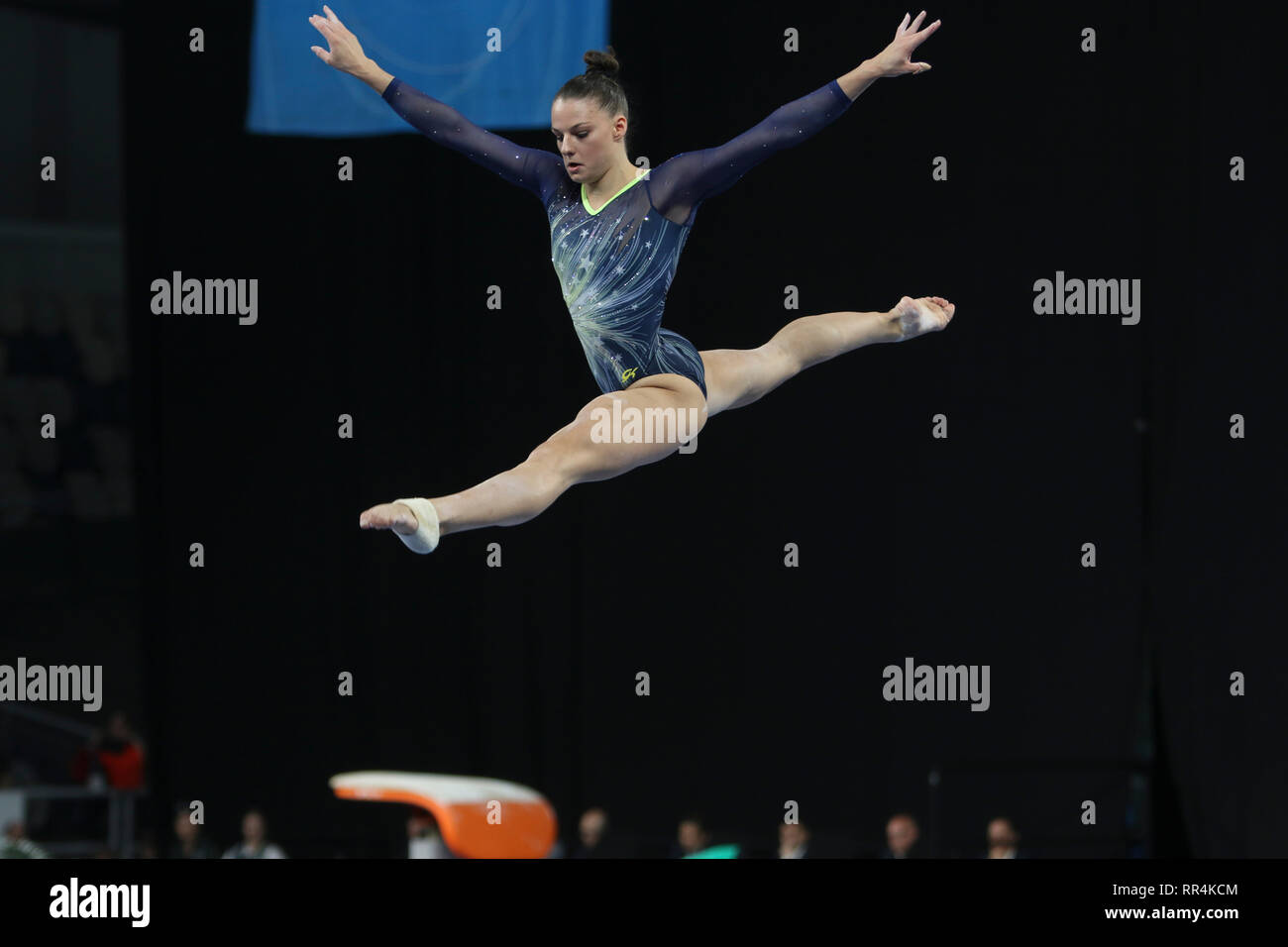Young gymnast jumping balance beam hi-res stock photography and images ...