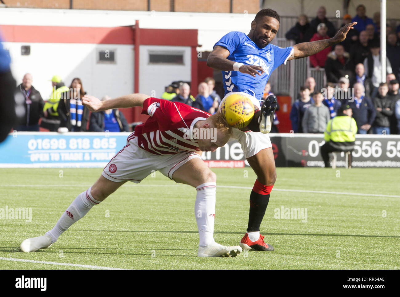 Rangers' Jermain Defoe and Hamilton's Ziggy Gordon (left) battle for ...