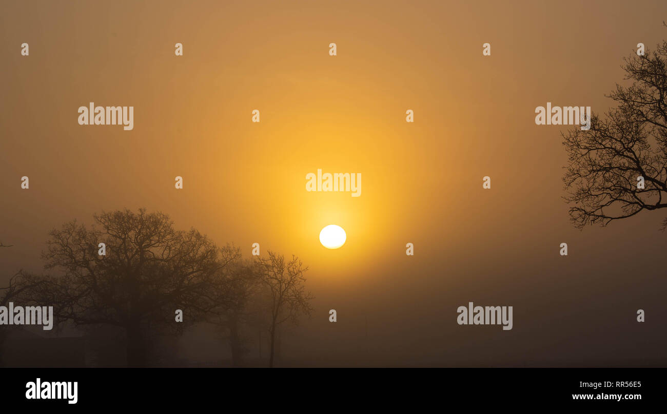 A Misty Sun Stock Photo - Alamy
