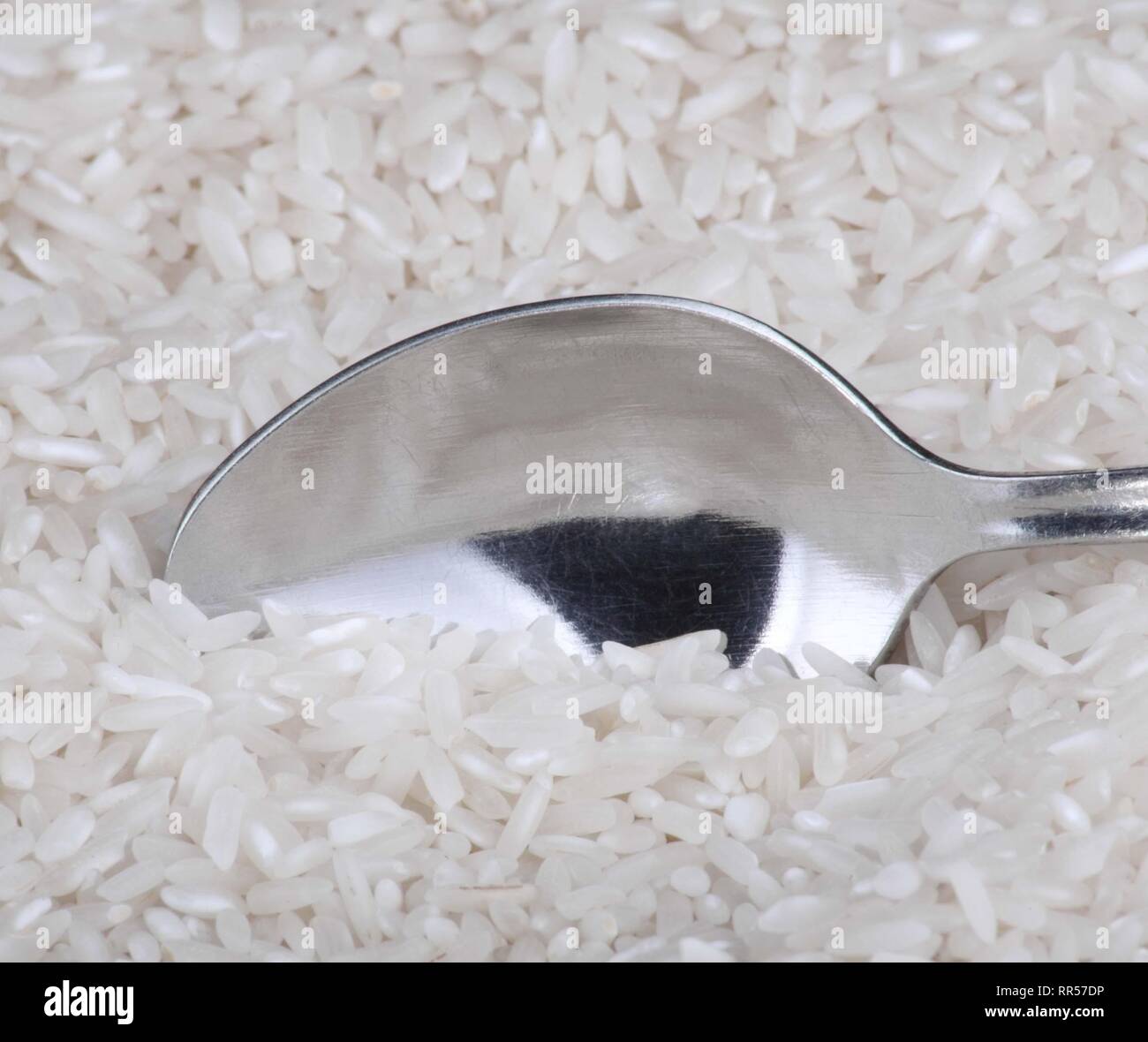 rice food background and teaspoon Stock Photo - Alamy