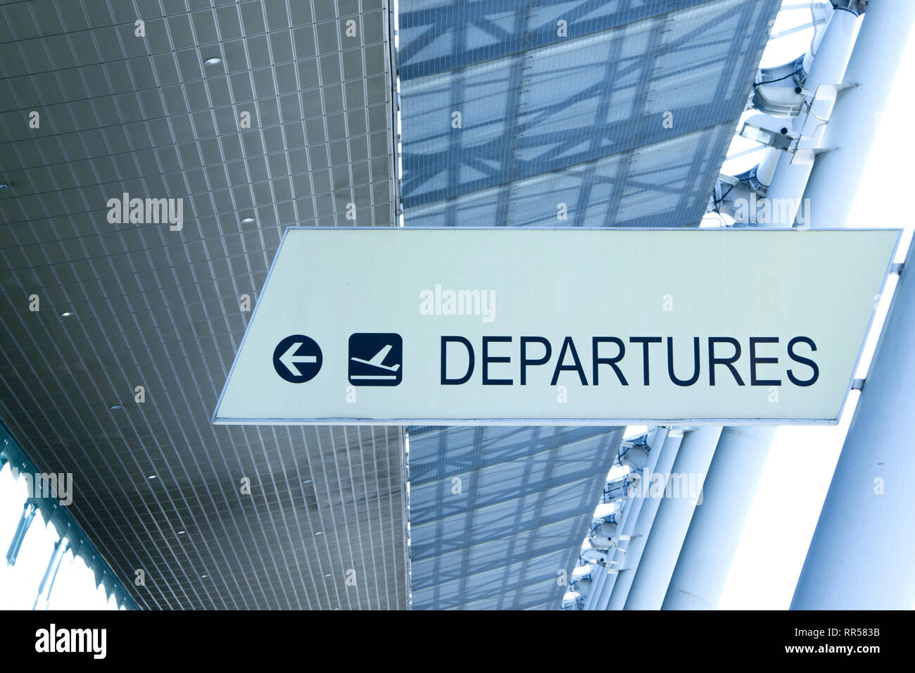 Airport departure sign. Directional sign in abstract modern airport ...