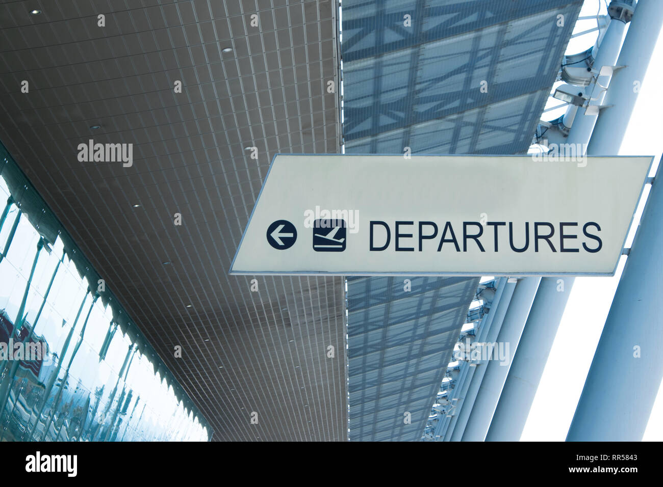 Airport departure sign. Directional sign in abstract modern airport ...