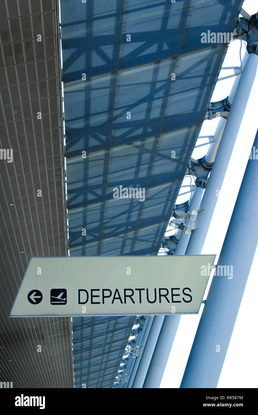 Airport departure sign. Directional sign in abstract modern airport ...