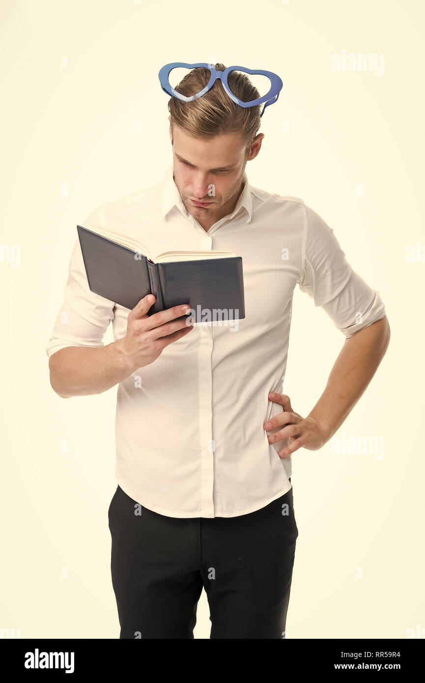 Reading poetry. Man handsome young searching nice poetry. Man busy face ...