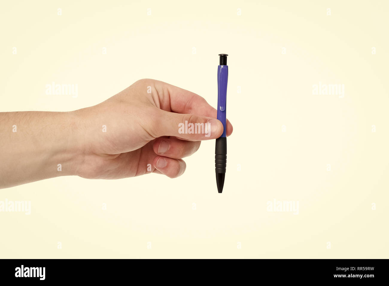 Write down. Pen in male hand isolated on white background. Write note ...