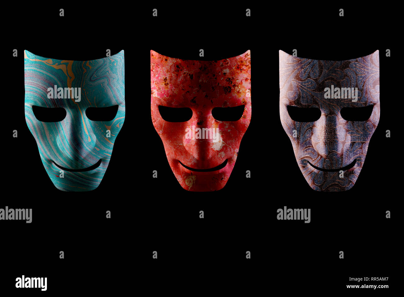Three face masks with different textures on a black background ...