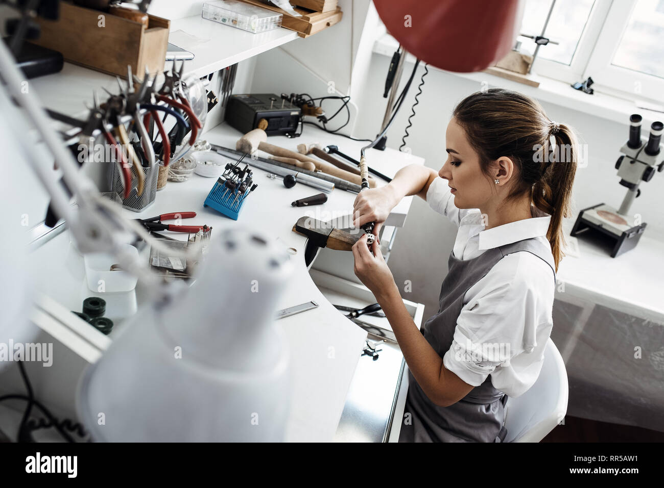 She is so passionate about her project... Side view of young female ...