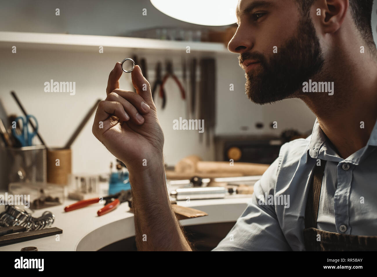 Inspecting jewelry hi-res stock photography and images - Alamy