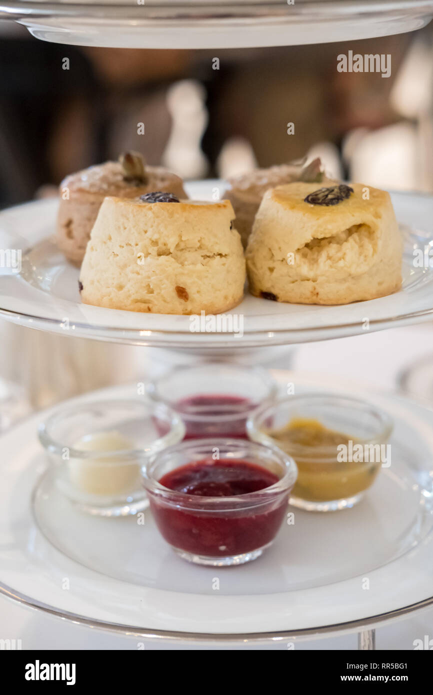 Close up of Scone with clotted cream and jam for Afternoon Tea Set ...