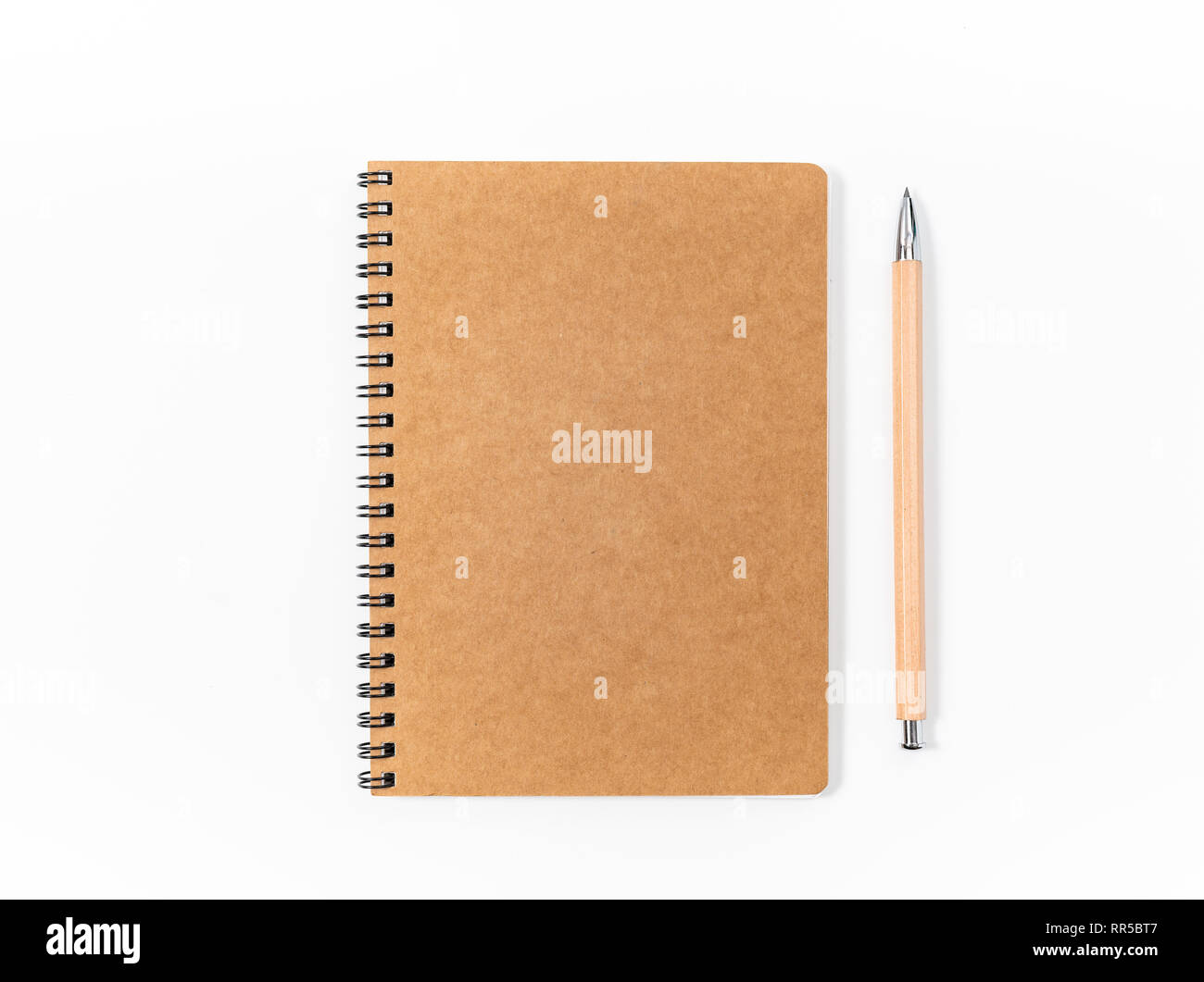 Brown spiral notebook isolated on white background.top view Stock Photo ...