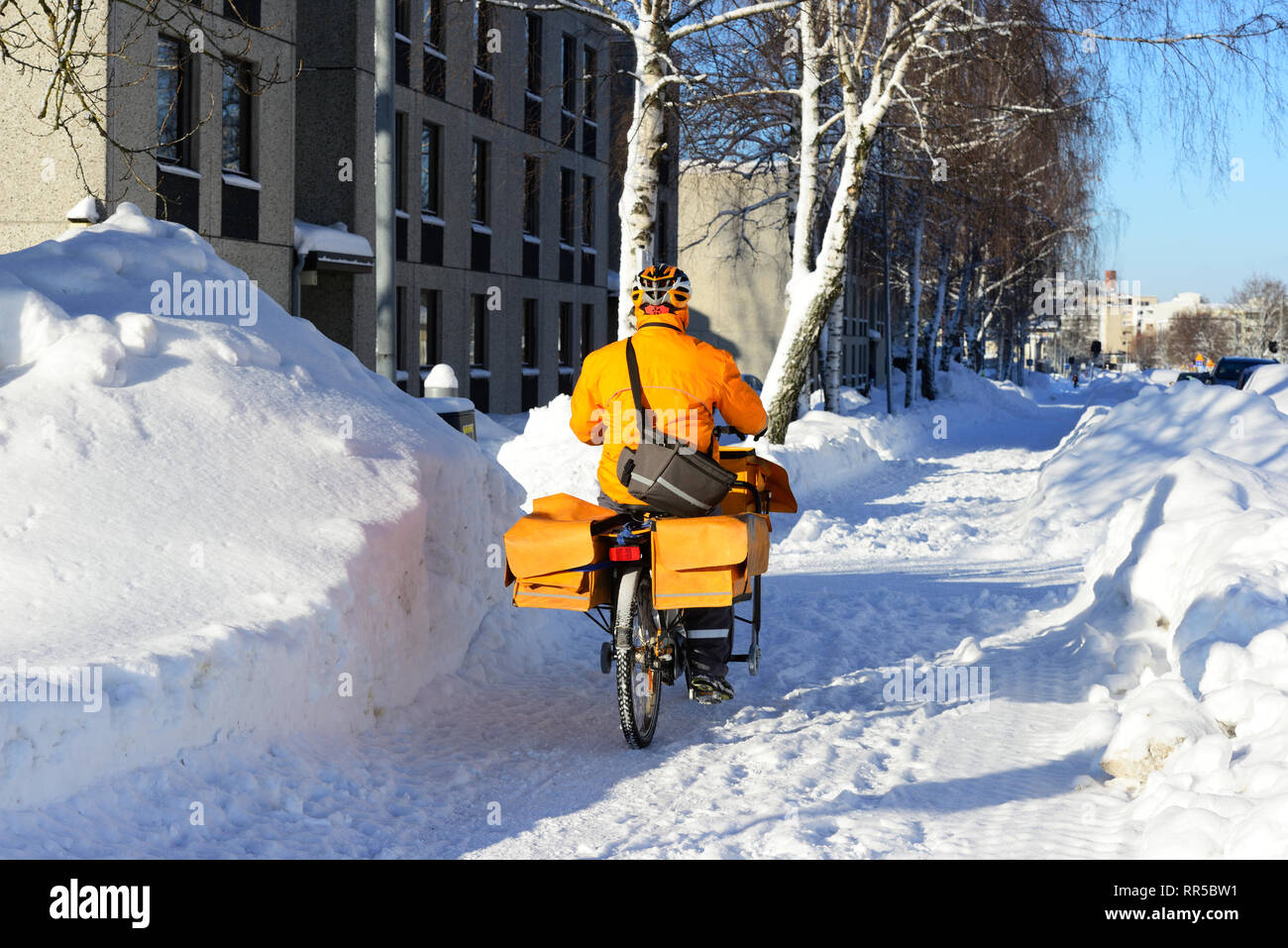 Delivery courier rides bicycle hi-res stock photography and images - Alamy