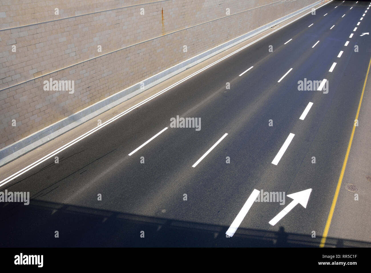 Lane and arrow marks on highway, showing the traffic lanes and ...