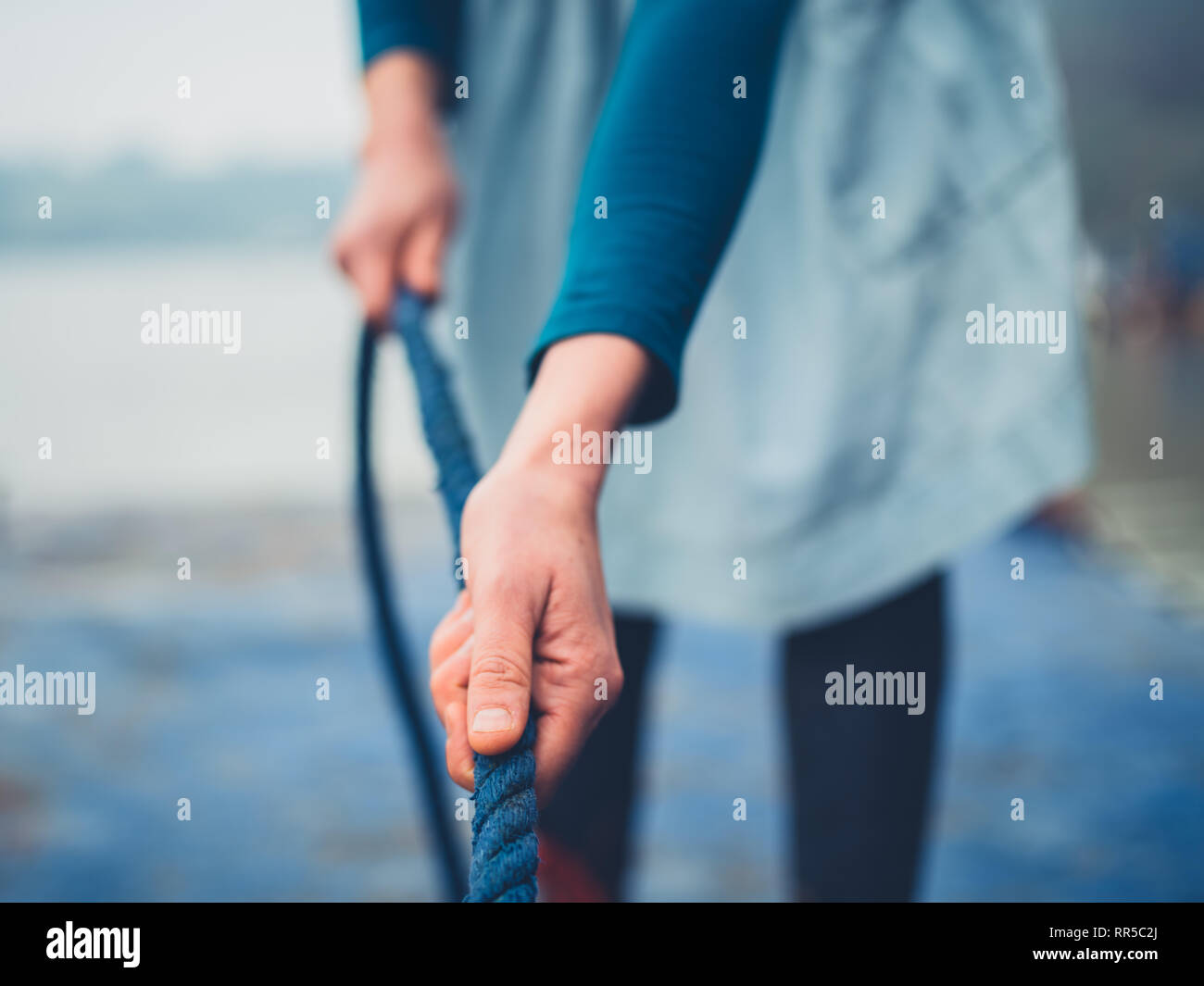Woman Pulling Rope Stock Photos & Woman Pulling Rope Stock Images - Alamy