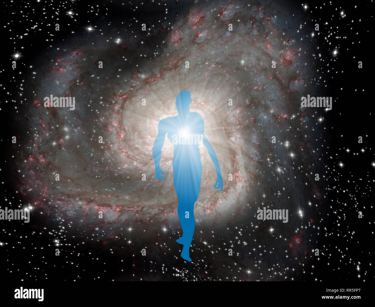 Man's silhouette with shining light in his chest Stock Photo - Alamy