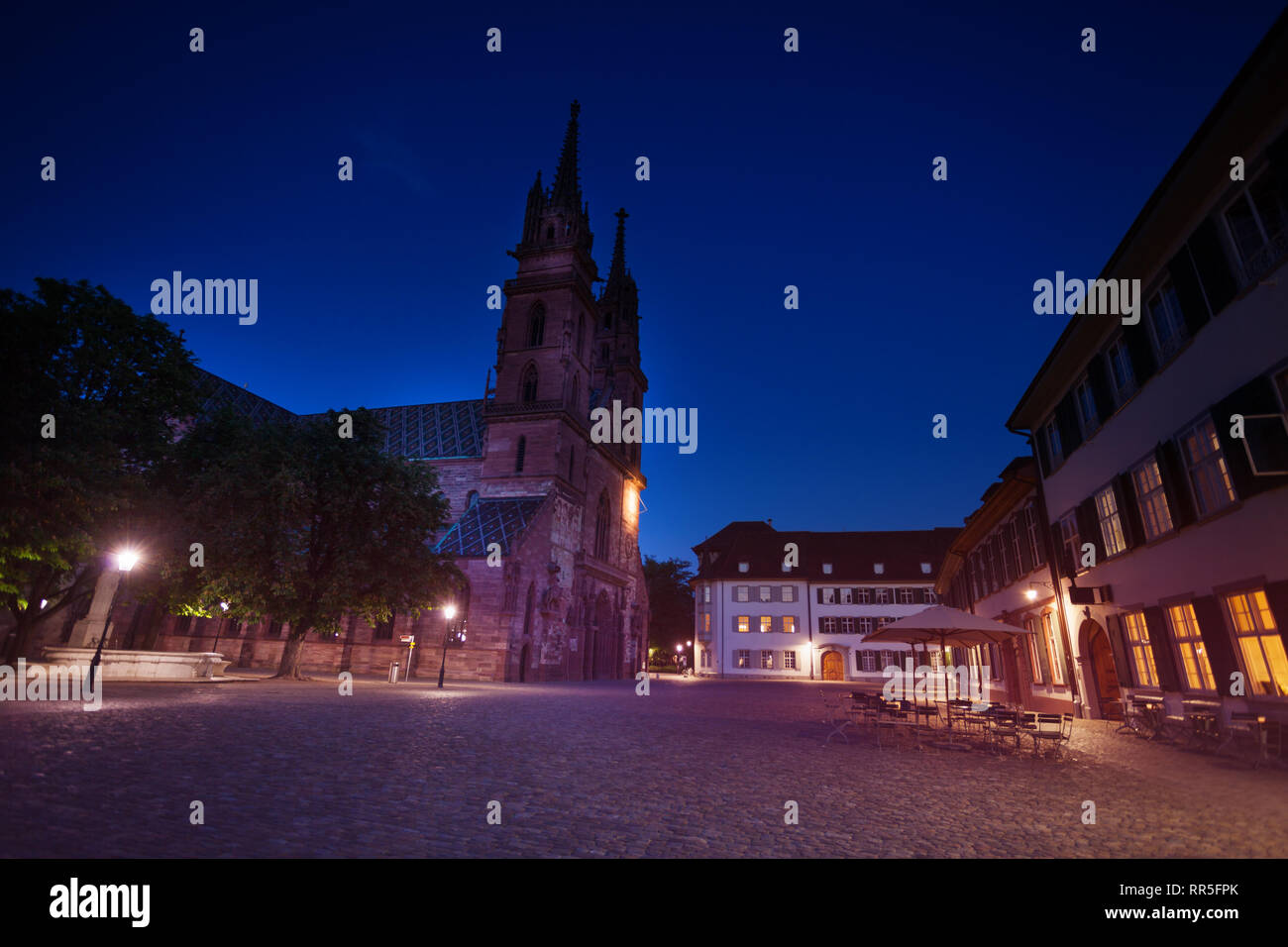 Towers of Basel Minster cathedral against dark sky Stock Photo - Alamy