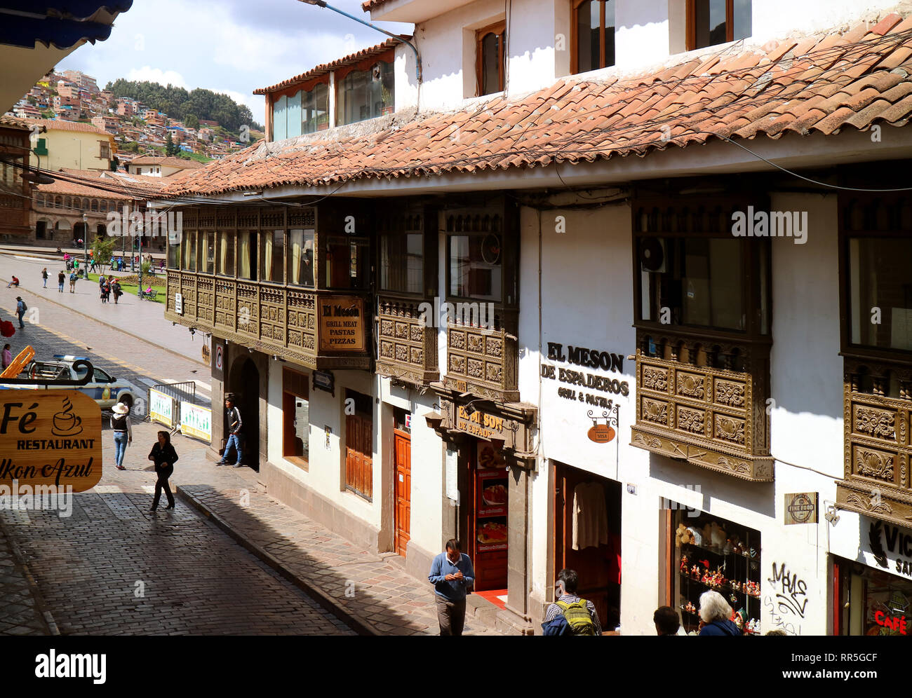 Alley from Plaza de Armas full of shops and cafes in Peruvian ...