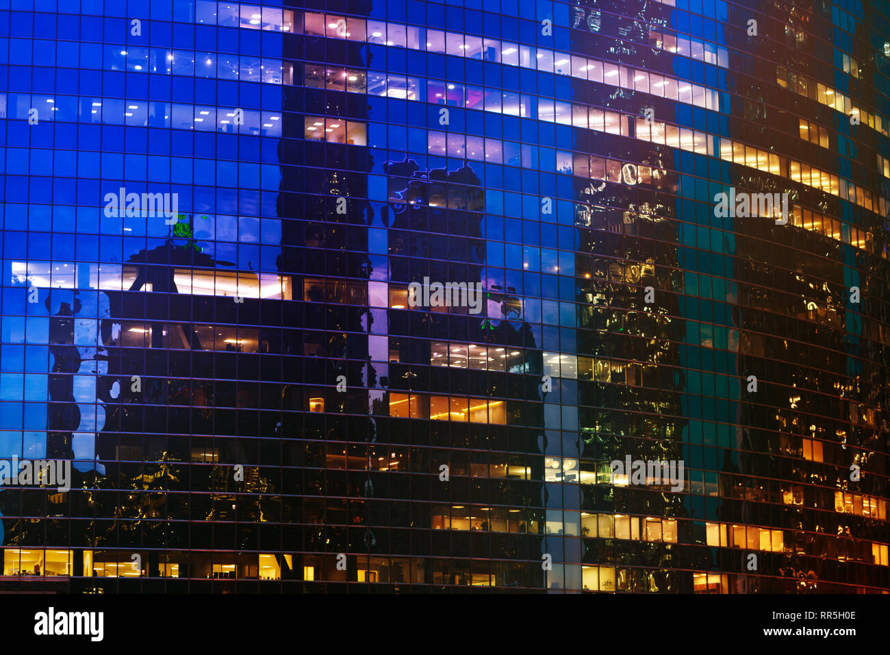 Chicago skyscraper with lightened windows at night Stock Photo - Alamy
