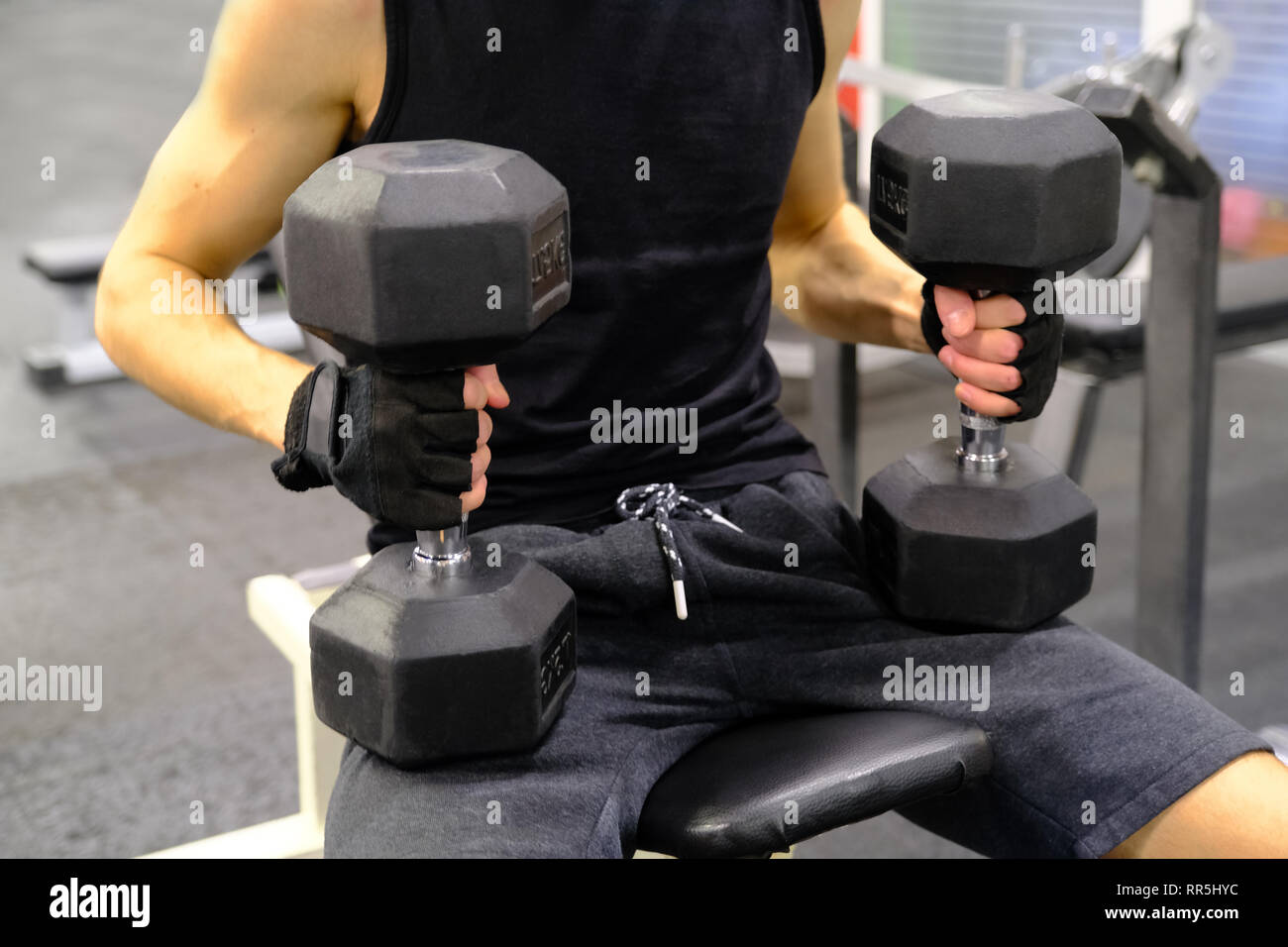 Handsome bodybuilder sitting on bench hi-res stock photography and ...