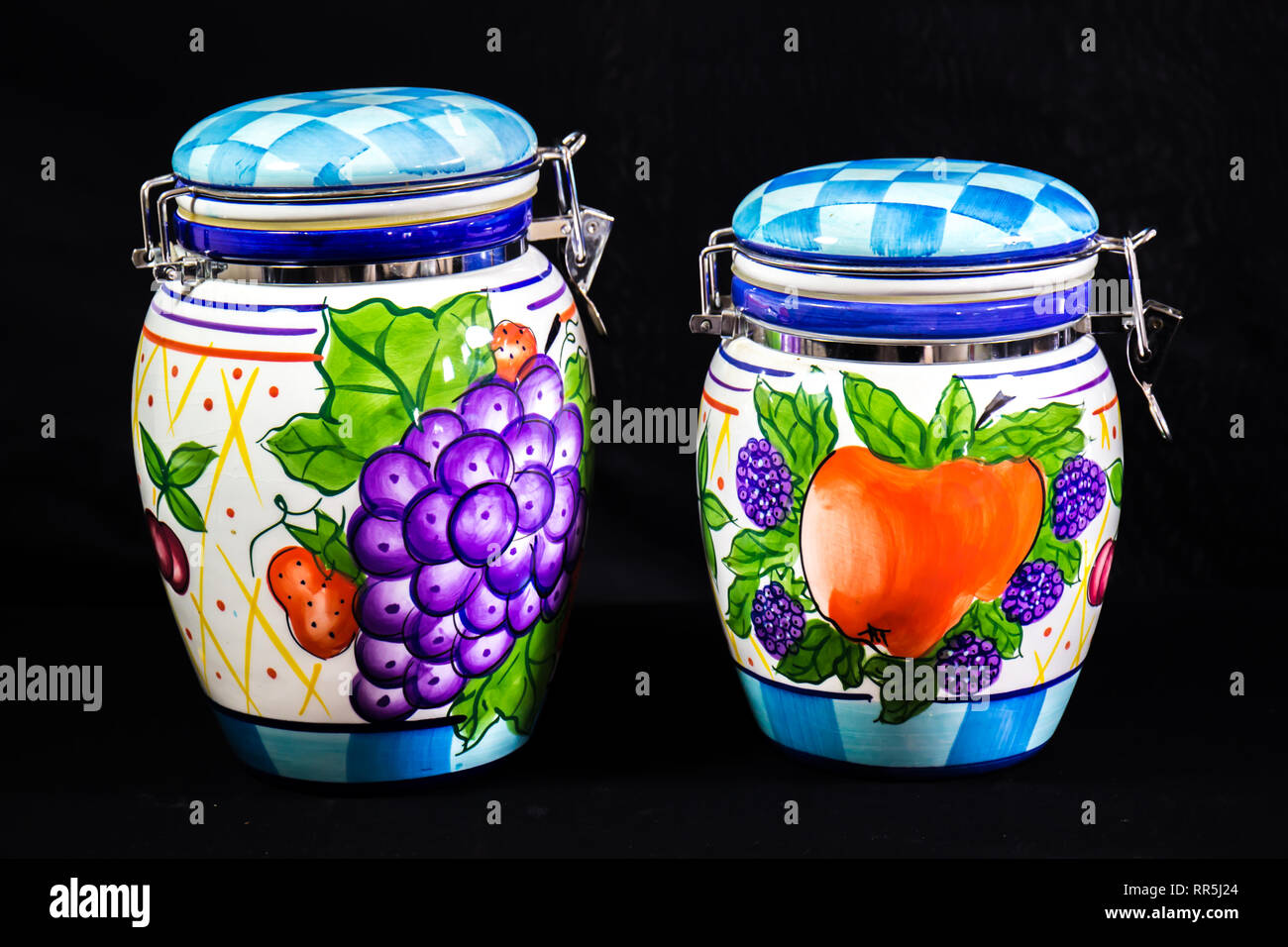 Two Ceramic Kitchen Containers With Checkerboard Lids Stock Photo - Alamy