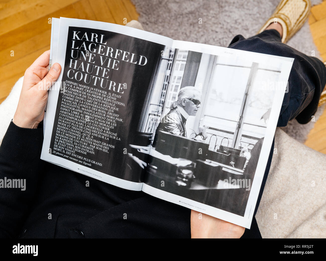Paris, France - Feb 23, 2019: Woman reading French magazine covering ...