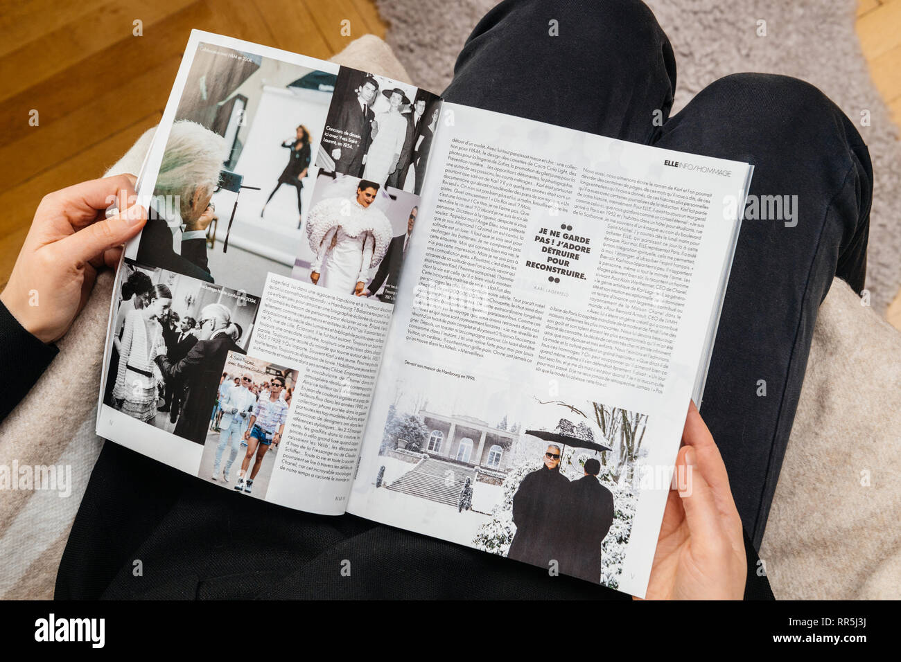 Paris, France - Feb 23, 2019: Woman reading French magazine covering ...