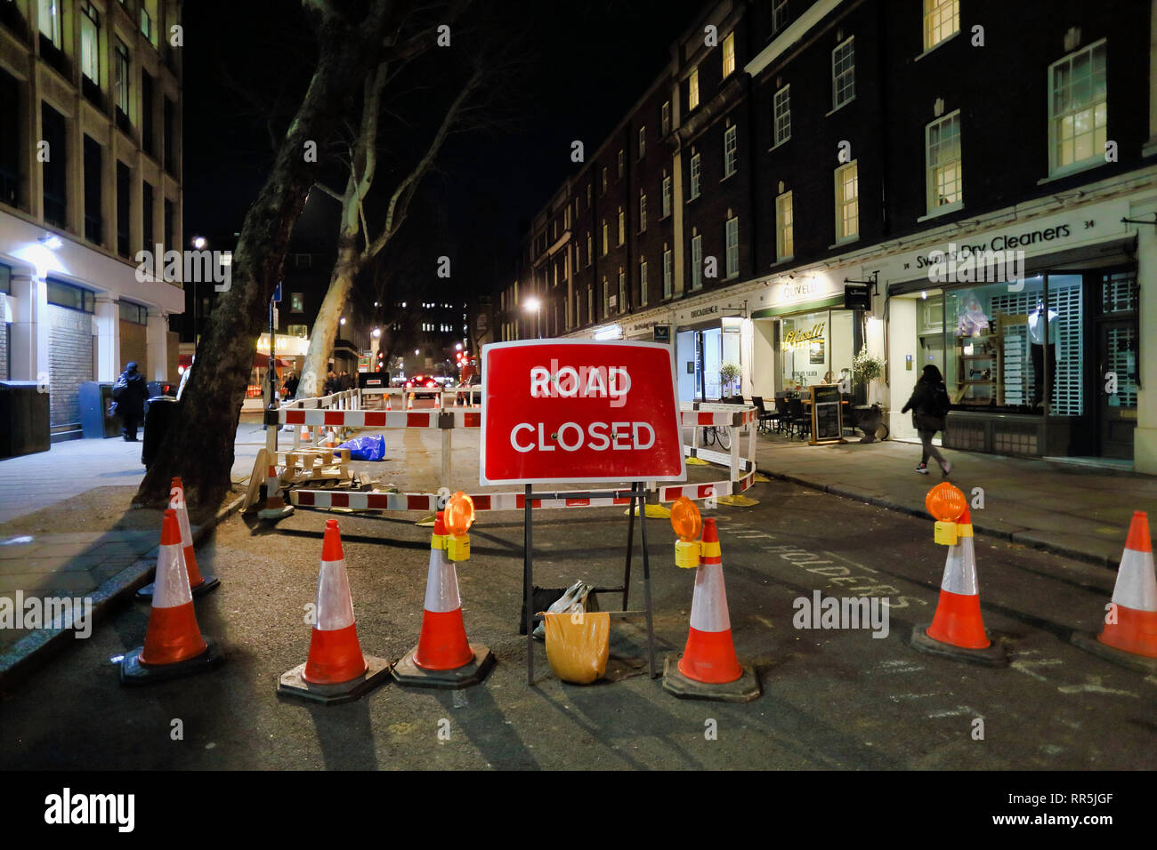 Road Closed sign and traffic cones in road, London, England, UK Stock ...
