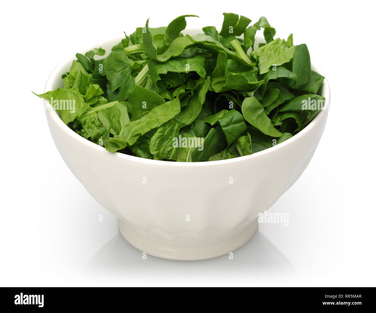 Fresh chopped spinach in white bowl isolated on white background Stock ...