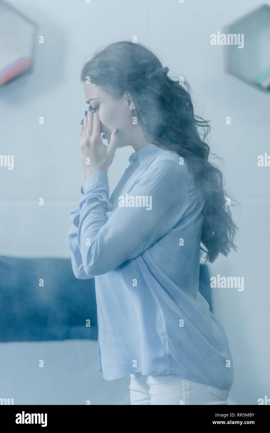 Hands covering face crying female hi-res stock photography and images ...